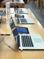 Precise angle of open MacBooks in the Apple Store - Boing Boing