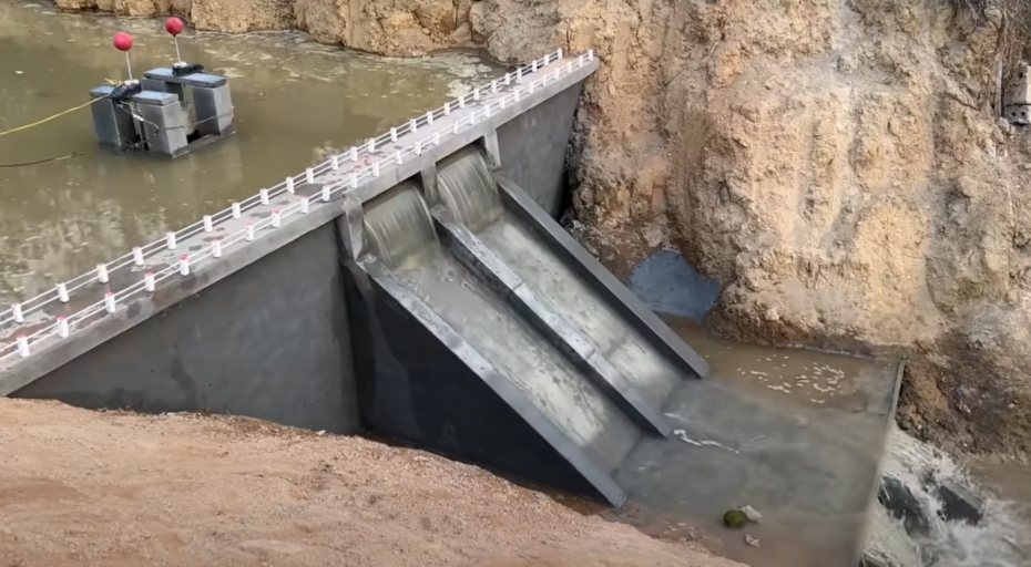 This miniature hydroelectric dam is a work of art (also, puppies ...